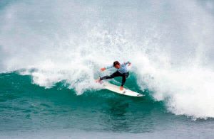 13 Awesome Places to Surf in New Zealand - GO Explore NZ